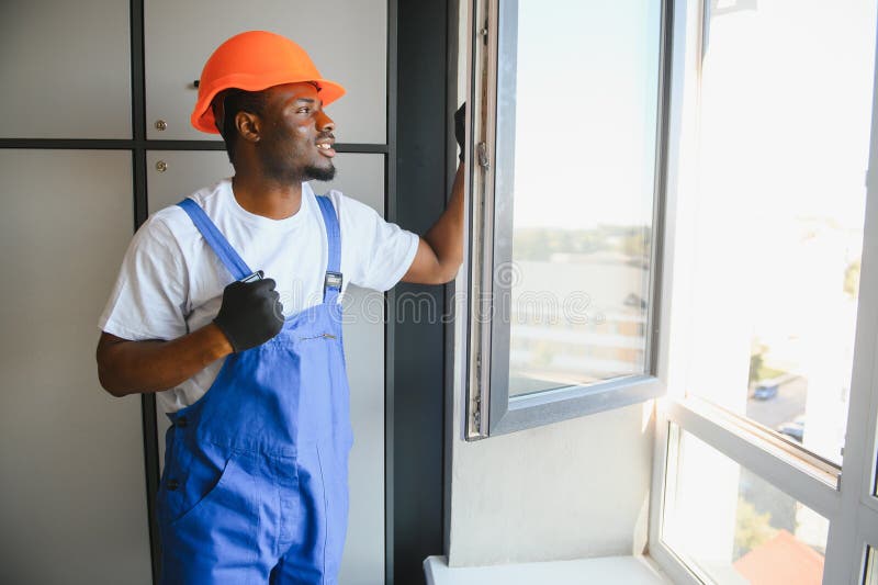 Worker in Installing White Plastic Upvc Window on House Stock Photo ...