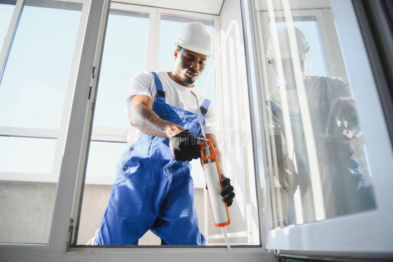 Worker in Installing White Plastic Upvc Window on House Stock Photo ...