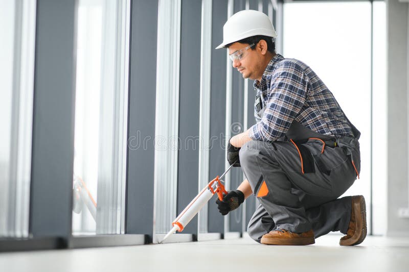 The Worker Installs a Window Frame in the Room Stock Image - Image of ...
