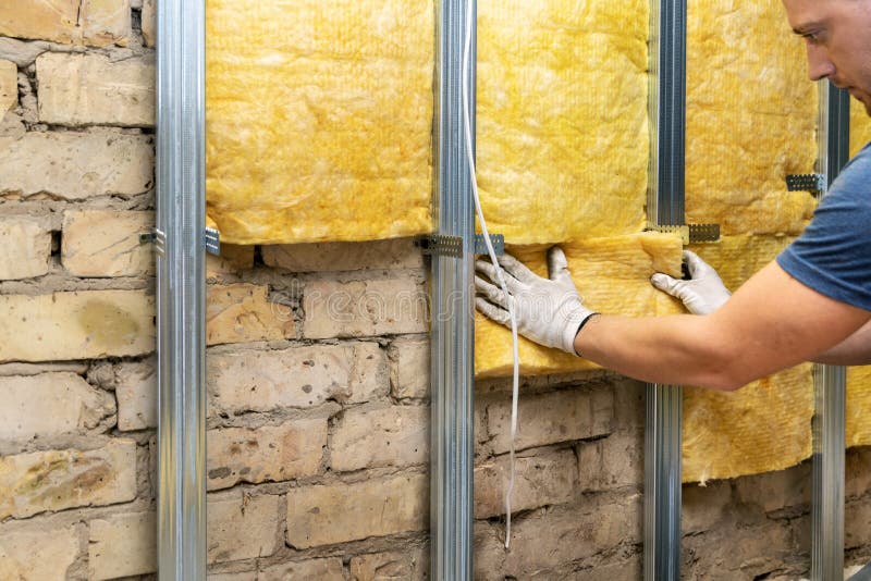 Worker Insulating Old Brick Wall with Glass Wool Sheets Stock Image ...