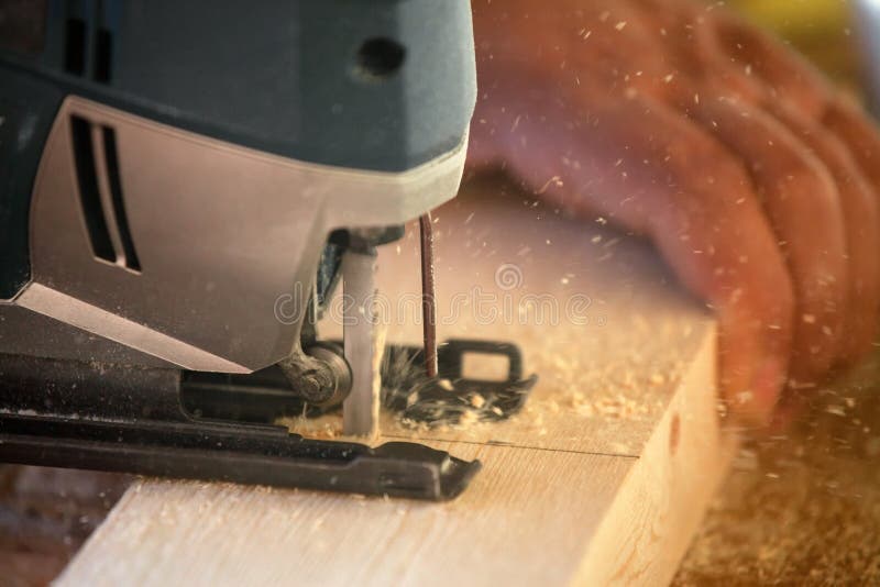 Worker with Jigsaws stock photo. Image of workman, board - 10580016