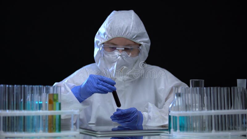 Worker of Laboratory Showing Sample of Toxic Ground before Camera ...