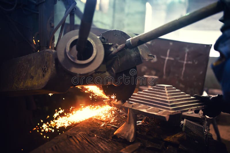 Factory Worker Working and Cutting Steel Iron with Angle Grinder Stock ...