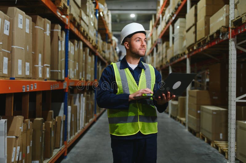 Worker with Laptop Computer in Mail Order Warehouse Stock Image - Image ...