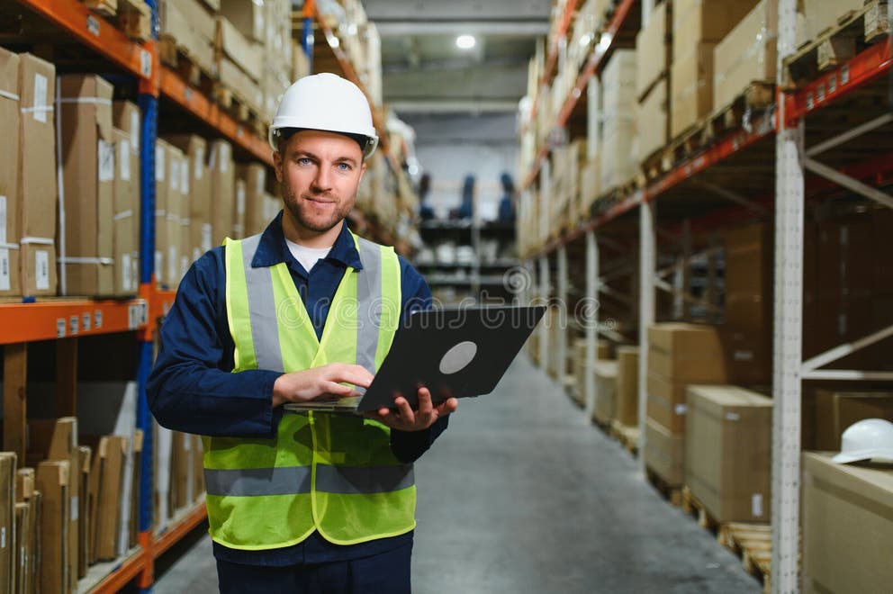 Worker with Laptop Computer in Mail Order Warehouse Stock Photo - Image ...