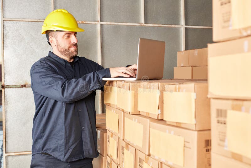 Worker with Laptop Computer in Warehouse Stock Photo - Image of export ...