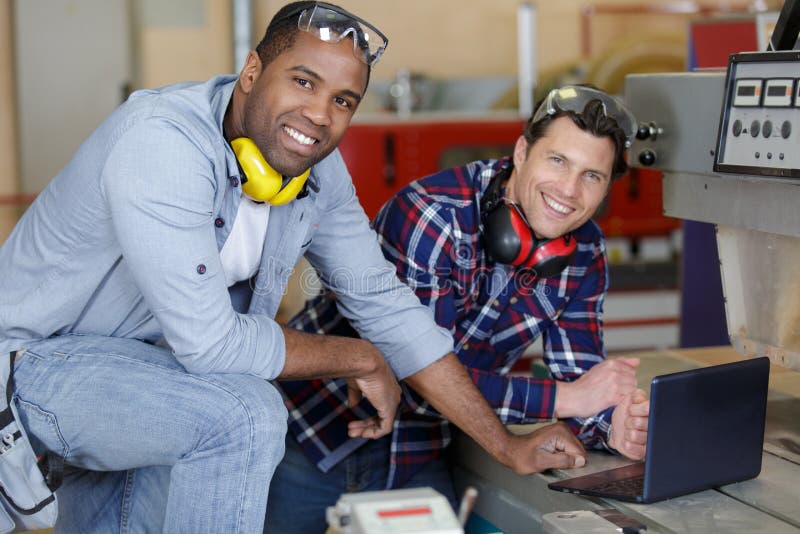 Worker with Laptop Engineer Working in Factory Area Stock Image - Image ...