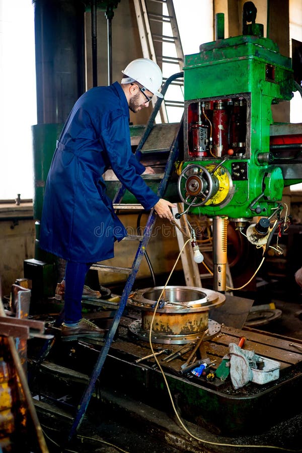 Worker with lathe stock image. Image of person, engineer - 93429329