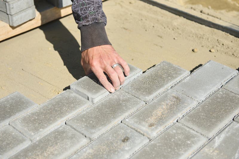 A Worker Lays Paving Slabs for a Sidewalk Stock Image - Image of hand ...