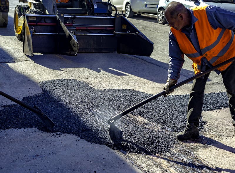 Road Worker Spraying Bitumen Emulsion Stock Photo - Image of ground ...