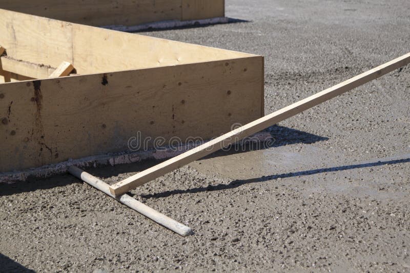 Worker Leveling Fresh Concrete Slab with Special Working Tool Stock ...