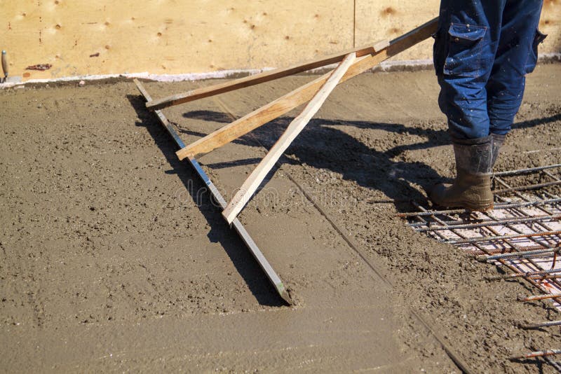 Worker Leveling Fresh Concrete Slab with Special Working Tool Stock ...