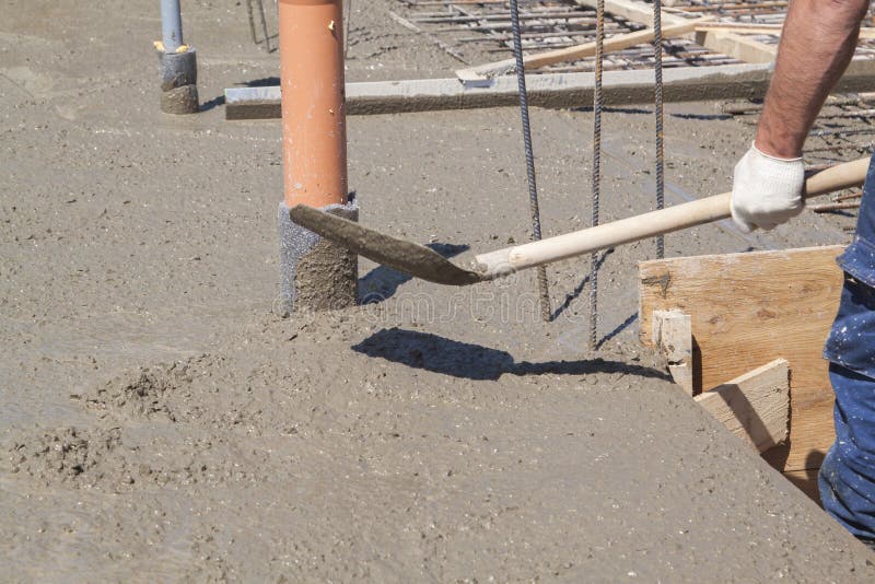 Worker Leveling Fresh Concrete Slab with a Special Working Tool Stock ...