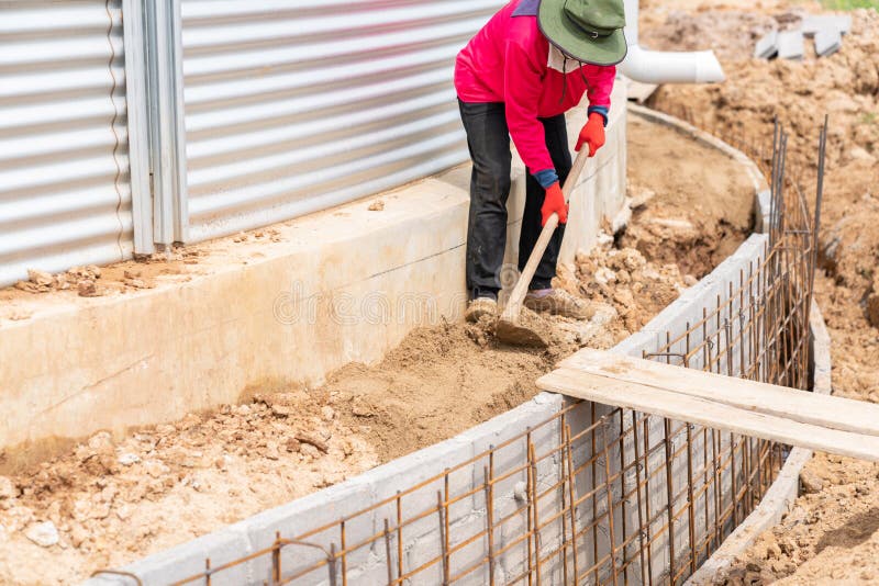 Worker is Leveling the Ground with a Shovel Stock Image - Image of ...
