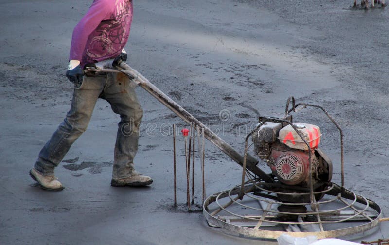 Worker Leveling Surface on Site Editorial Photography - Image of ...