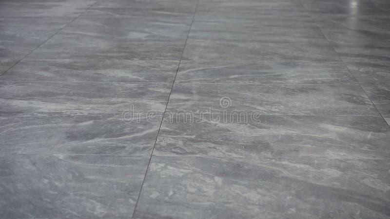 The Process of Leveling Plaster on a Wall Using a Tool. the Worker ...