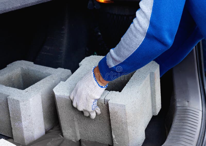 Worker Loads Cinder Blocks from Cement Slurry for Construction Stock ...