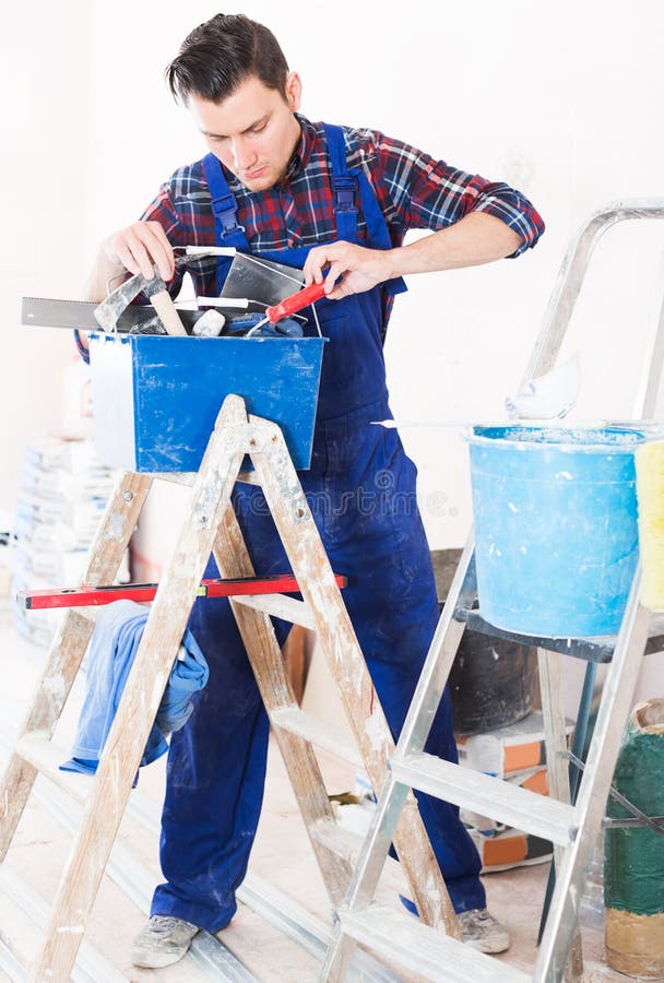 Worker Looking for Necessary Tool in Toolbox Stock Image - Image of ...
