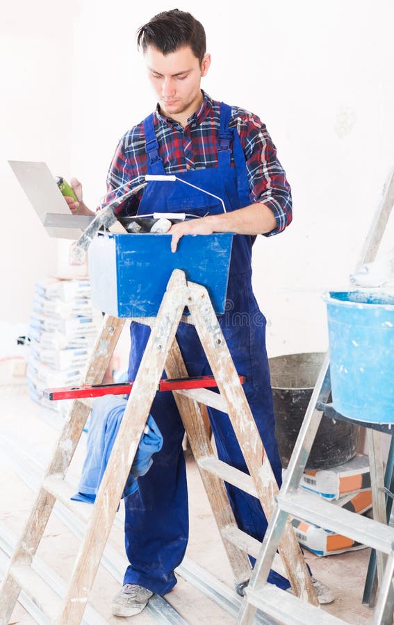 Worker Looking for Necessary Tool in Toolbox Stock Image - Image of ...