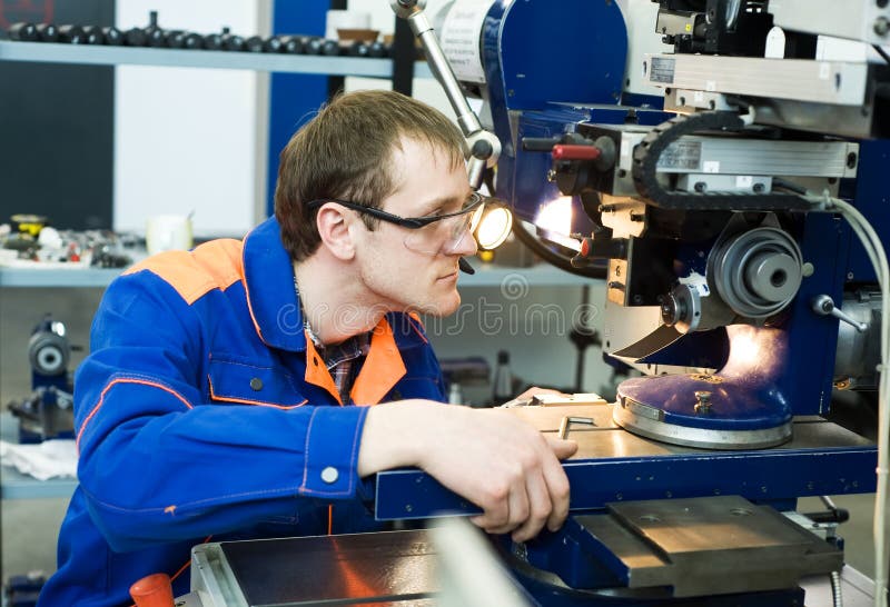 Worker at Machine Tool Operating Stock Photo - Image of machining ...