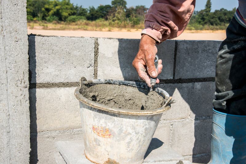 Worker Make Concrete Wall by Cement Block and Plaster at Constru Stock ...