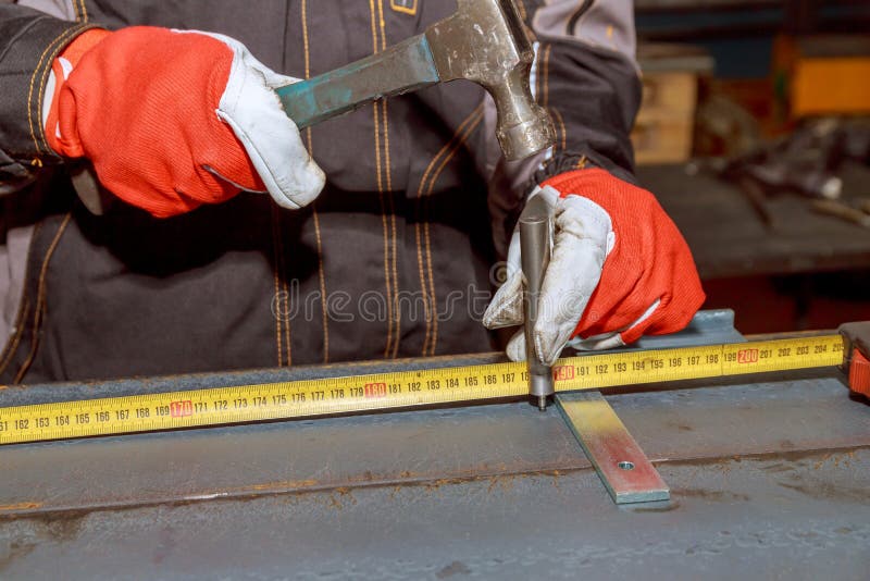 The Worker Makes a Mark on a Metal Surface by Means of Measuring Square ...