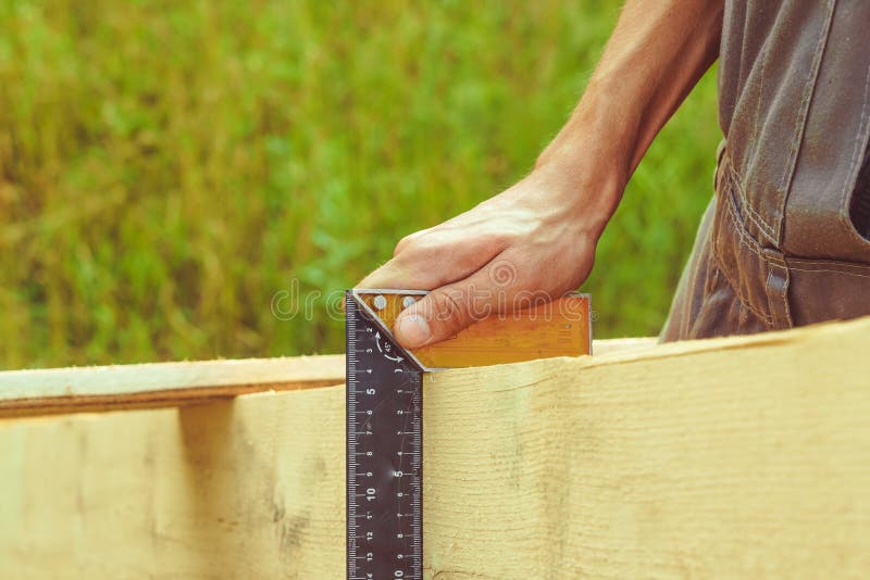 The Worker Makes Measurements with a Tape Measure Stock Photo - Image ...