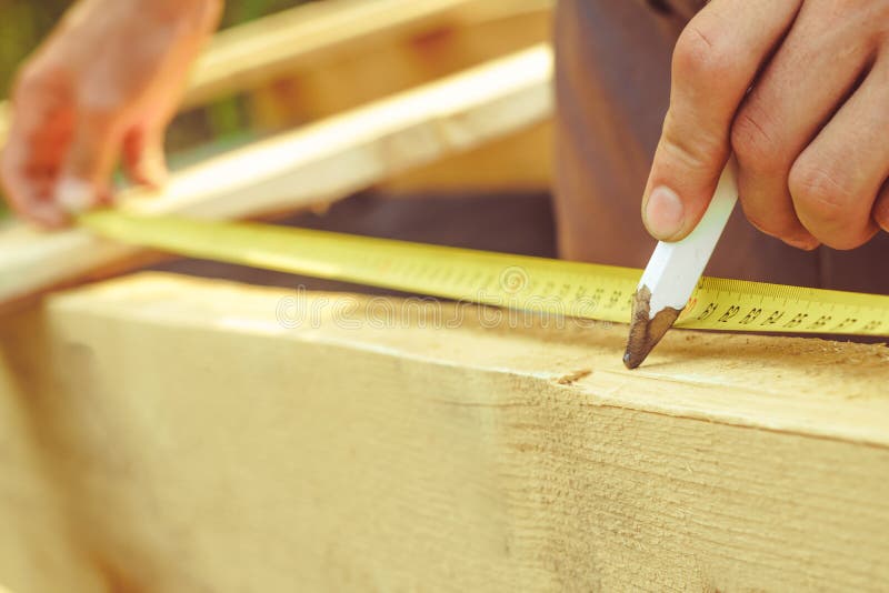 The Worker Makes Measurements with a Tape Measure Stock Photo - Image ...