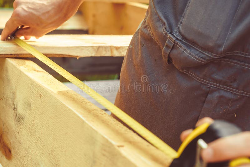 The Worker Makes Measurements with a Tape Measure Stock Photo - Image ...