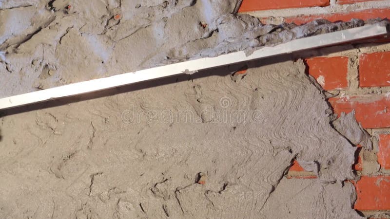 Worker Makes Plaster Wall by Level Tool and Grey Stock Video - Video of ...
