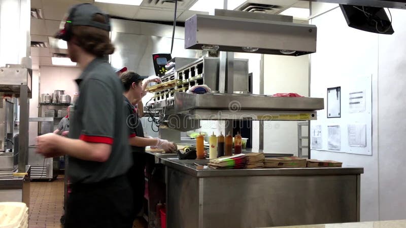 Worker Making Burgers for the Customer Inside Burger Kings Stock ...