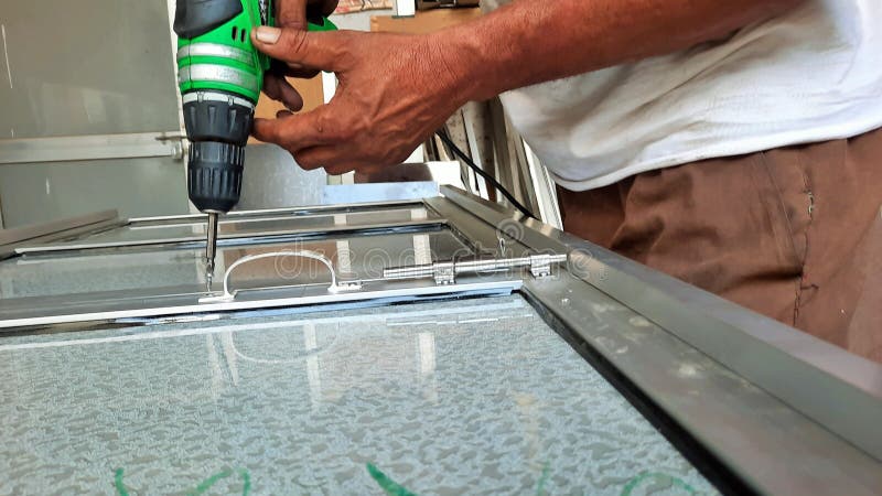 Worker Making Hole or Drilling in Metal Using Electric Drill Machine ...