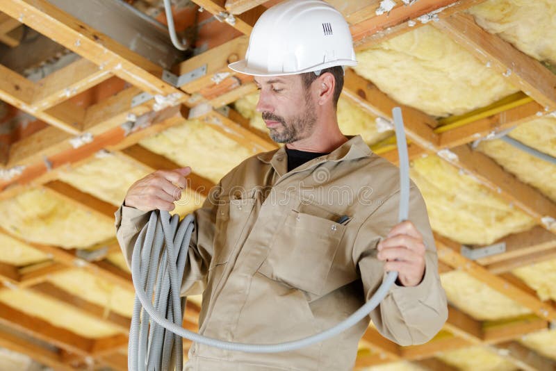 Worker Making Mounting for Electric Cable in Ceiling Stock Image ...