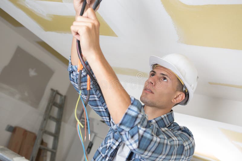 Worker Making Mounting for Electric Cable in Ceiling Stock Image ...