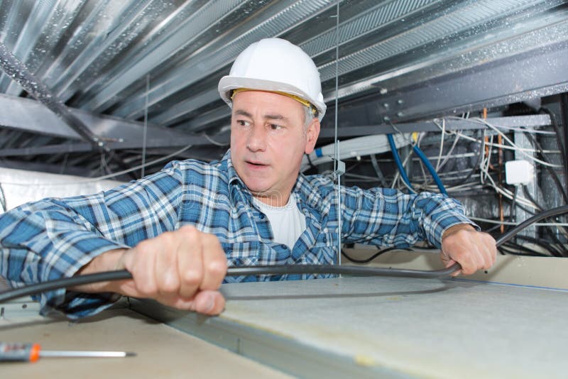 Worker Making Mounting for Electric Cable in Ceiling Stock Image ...