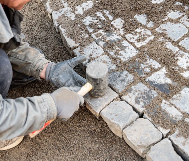 Worker Making the Pavement of Stone Blocks Stock Image - Image of ...