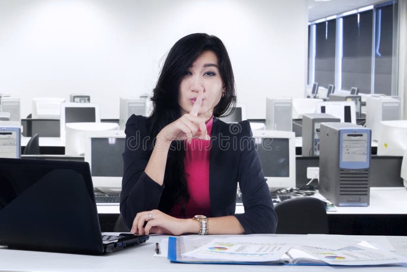 Worker making silent sign stock photo. Image of lips - 54568722
