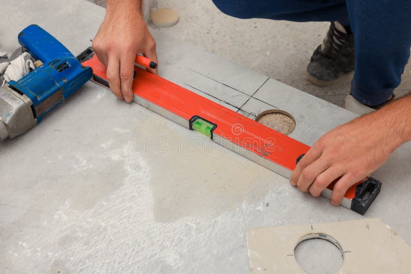 Worker Making Socket Hole in Tile Indoors, Closeup Stock Image - Image ...