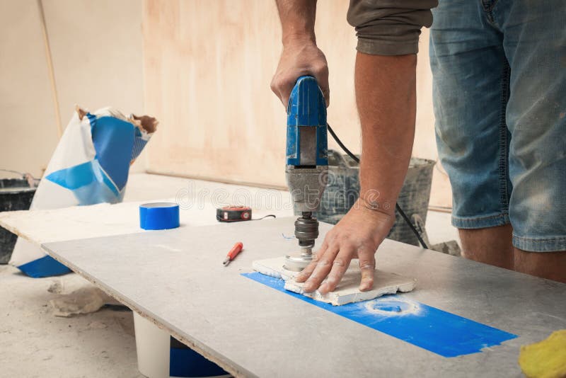 Worker Making Socket Hole in Tile Indoors, Closeup Stock Image - Image ...