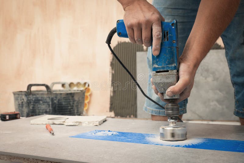 Worker Making Socket Hole in Tile Indoors, Closeup Stock Image - Image ...
