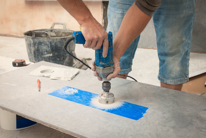 Worker Making Socket Hole in Tile Indoors, Closeup Stock Image - Image ...