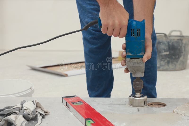 Worker Making Socket Hole in Tile Indoors, Closeup Stock Photo - Image ...