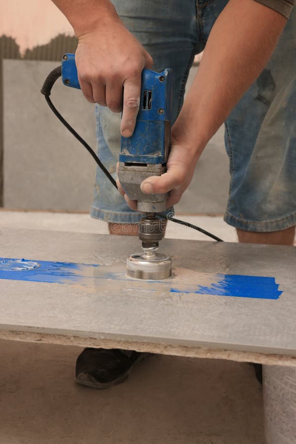 Worker Making Socket Hole in Tile Indoors, Closeup Stock Image - Image ...