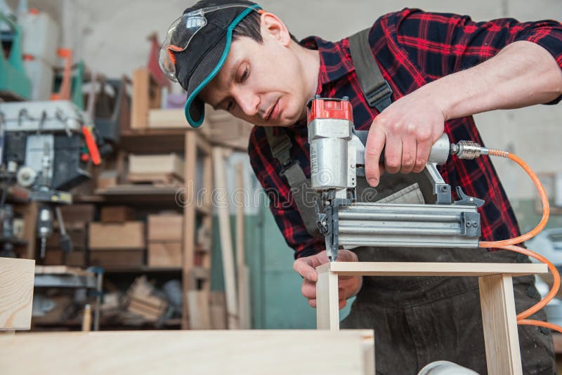 Worker making the wood box stock photo. Image of artist - 140975818
