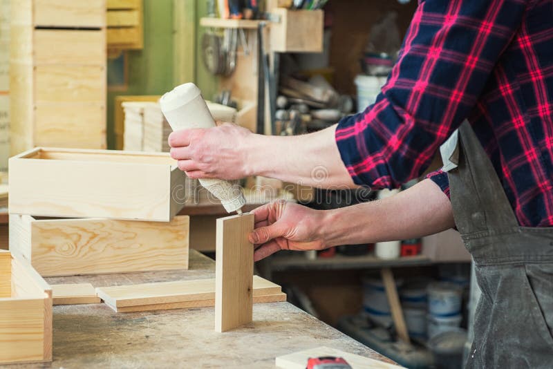Worker making the wood box stock image. Image of furniture - 140707635