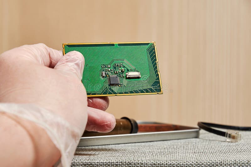 Worker Man Analyzing on a PCB with a Chip in the Laboratory Stock Image ...