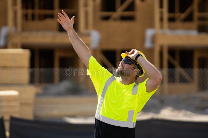 Worker Man on the Building Construction. Construction Site Worker in ...