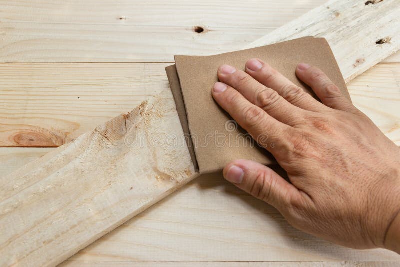 Worker Man Polishing Sandpaper Wood by Hand. Stock Image - Image of ...
