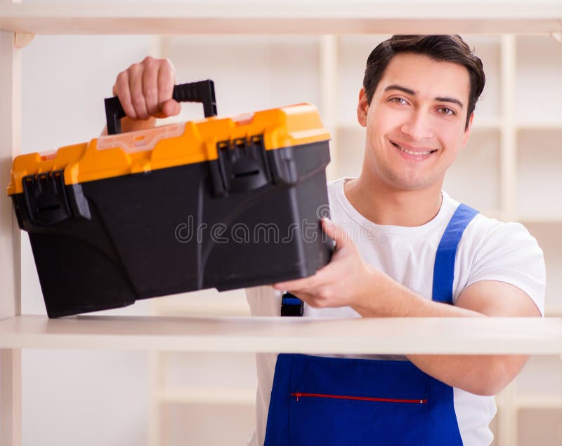 Worker Man Repairing Assembling Bookshelf Stock Image - Image of ...