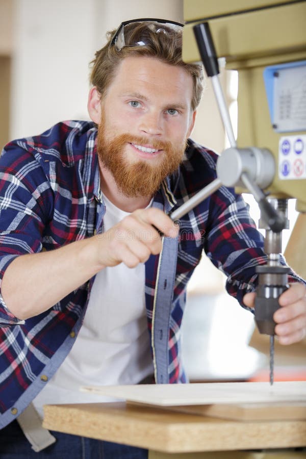 Worker Man Uses Drilling Machine Stock Photo - Image of drilling ...